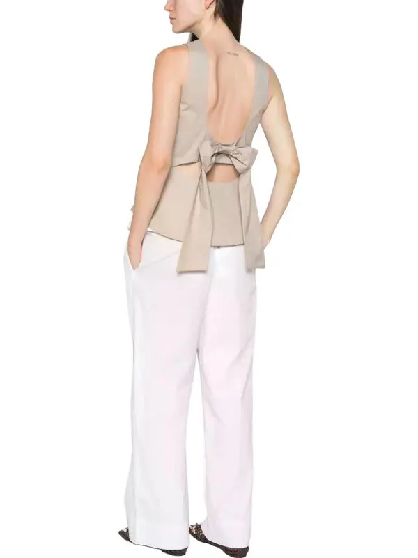MOUTAKI Sleeveless Bow Detail Peplum Blouse - Neutrals