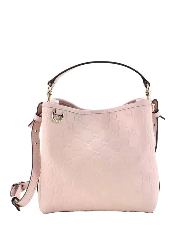 Gucci Gg Emblem Gg Embossed Leather Small Bucket Bag - Pink