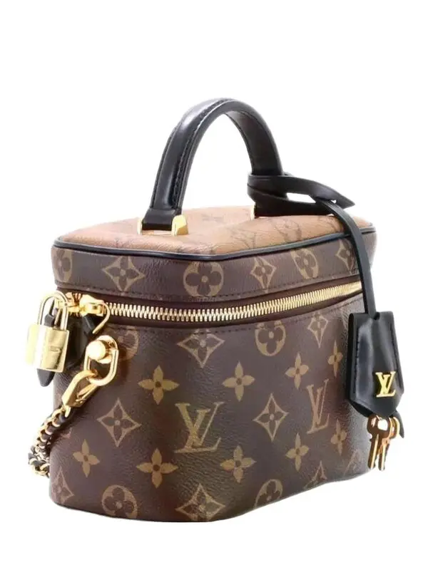 LOUIS VUITTON Reverse Monogram Canvas Pm Satchel - Brown