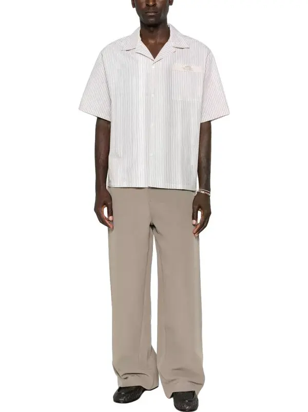 Amiri Elasticated-waistband Logo-patch Trousers - Neutrals