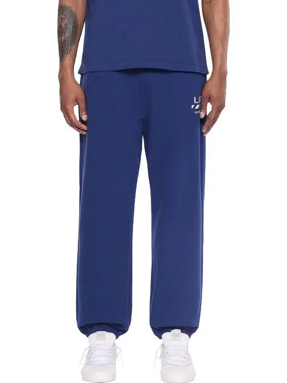 L/AB C/O OFF-WHITE Diagonal Stripe Logo Cotton French Terry Joggers - Marine