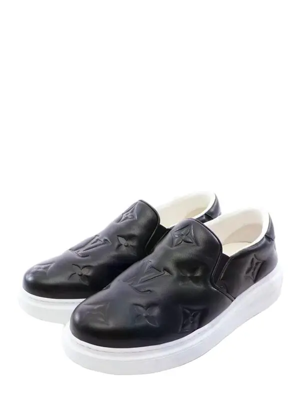 LOUIS VUITTON Monogram-embossed Slip-on Sneakers - Black
