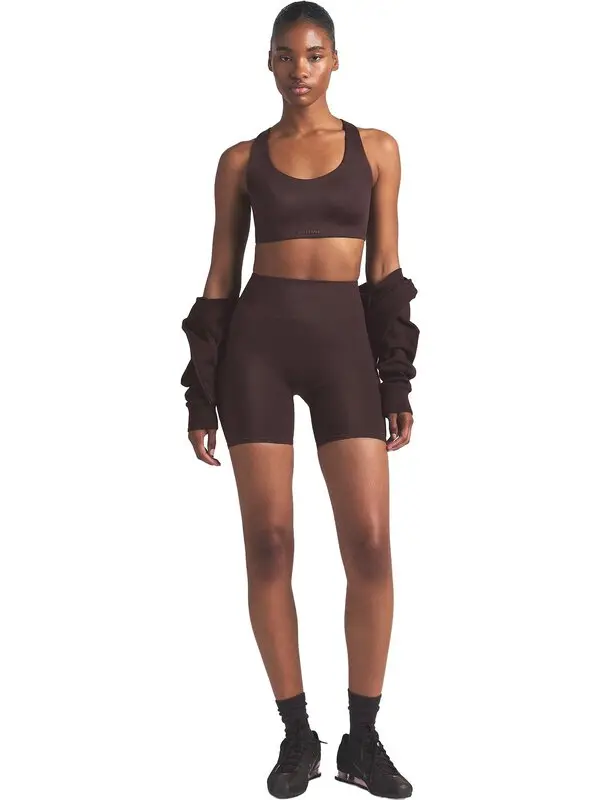 SKIMS Racerback Bra | Deep Neutral | | Nike Shine - Phoenix