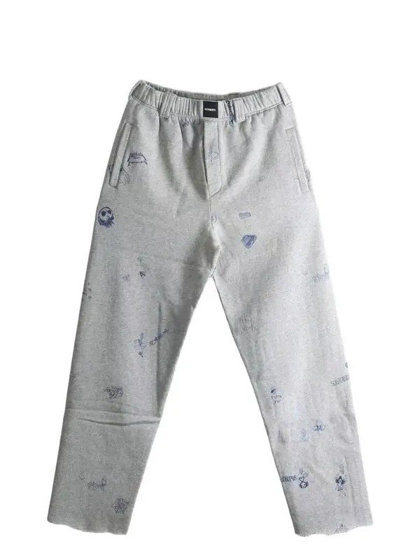 Vetements Scribble-print Raw-edge Track Pants - Grey