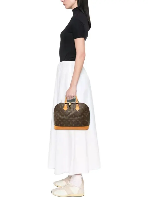 LOUIS VUITTON Monogram Alma Pm Handbag - Brown