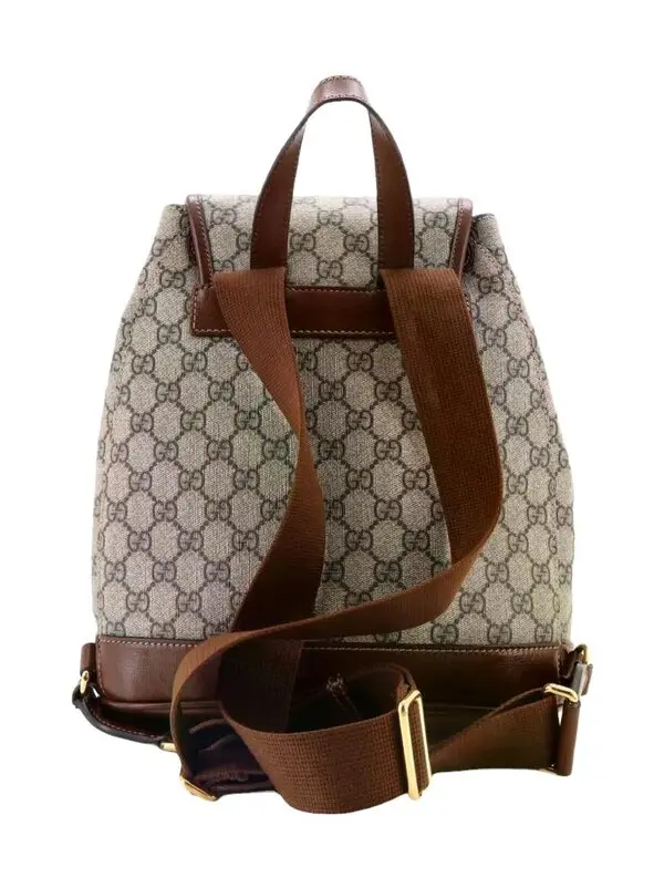 Gucci Interlocking G Patch Drawstring Flap Gg Coated Canvas Backpack - Brown