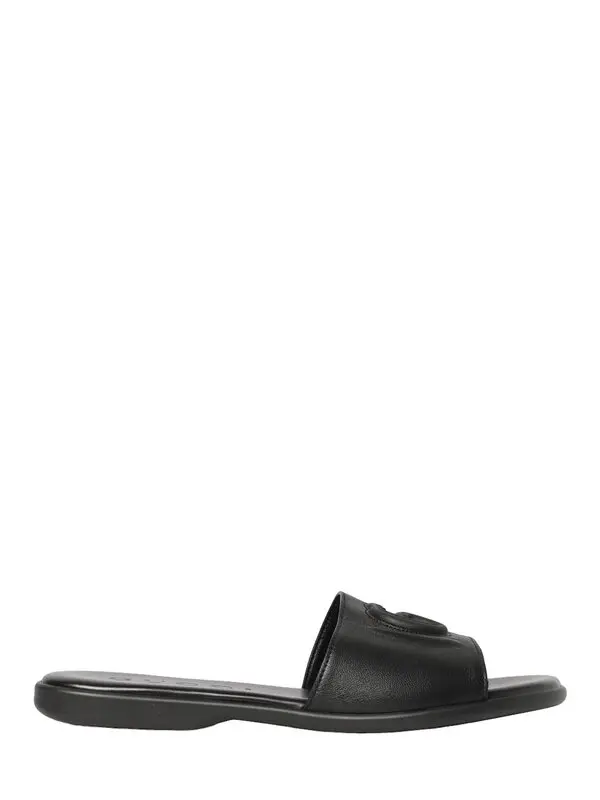 Gucci Calfskin Leather Slides With Embossed Gg Monogram - Black