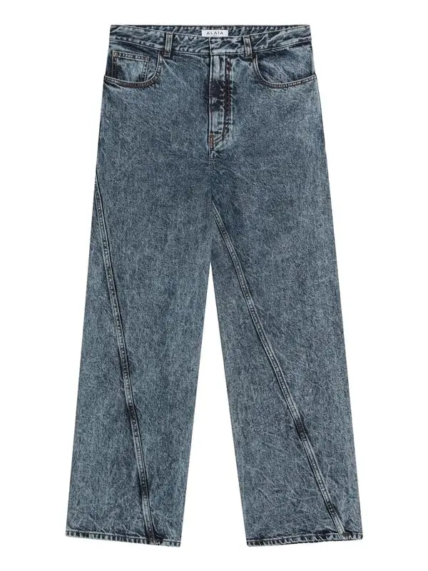 Alaïa Twisted Stonewashed Denim Jeans - Blue