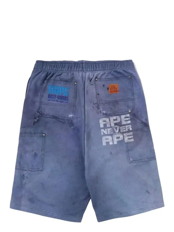 A BATHING APE Distressed Logo Print Shorts - Blue