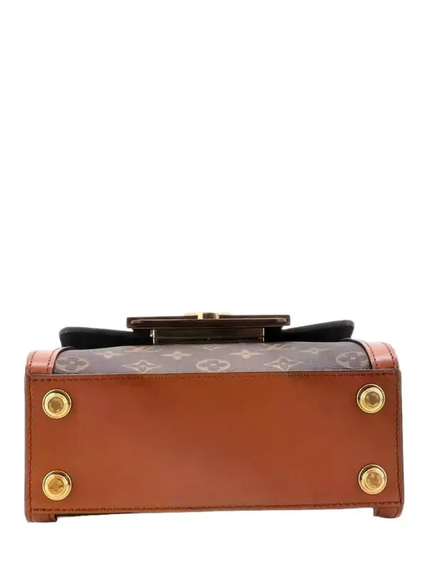 LOUIS VUITTON Dauphine Capitale Shoulder Bag In Reverse Monogram Canvas - Brown