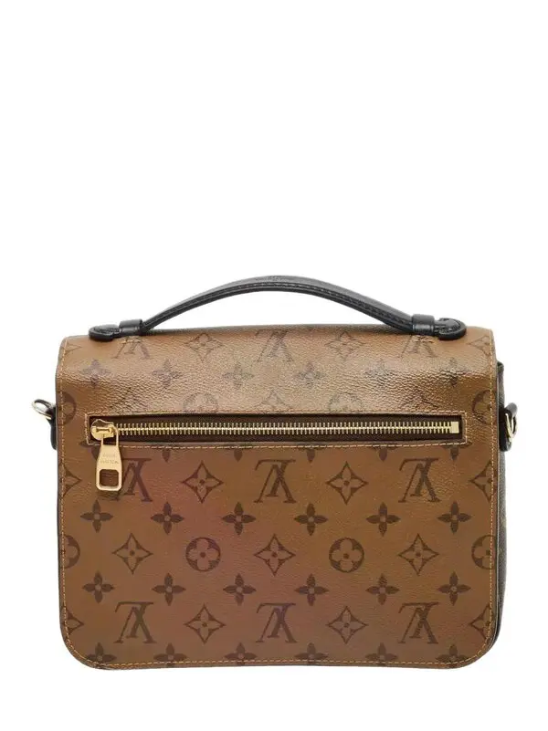 LOUIS VUITTON Pochette Métis Monogram Reverse - Brown