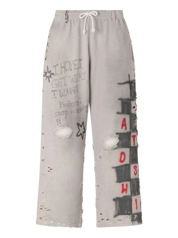 SATOSHI NAKAMOTO Get What I Want Printed Embellished Distressed Cotton-jersey Sweatpants - Gray