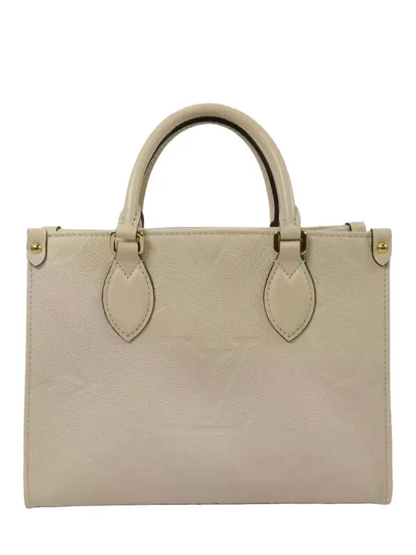 LOUIS VUITTON On The Go Monogram Empreinte Tote Bag - Neutrals