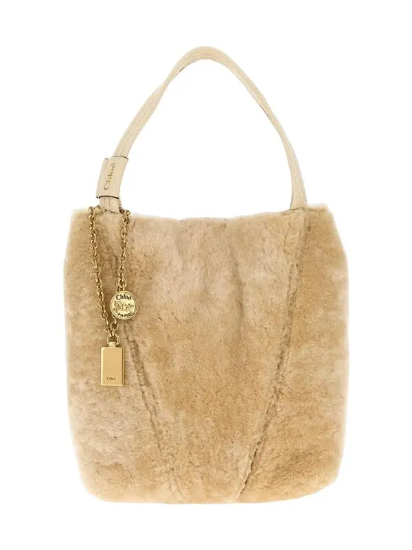 Chloé Spin Shearling Shoulder Bag With Double Handle And Decorative Charm - Beige