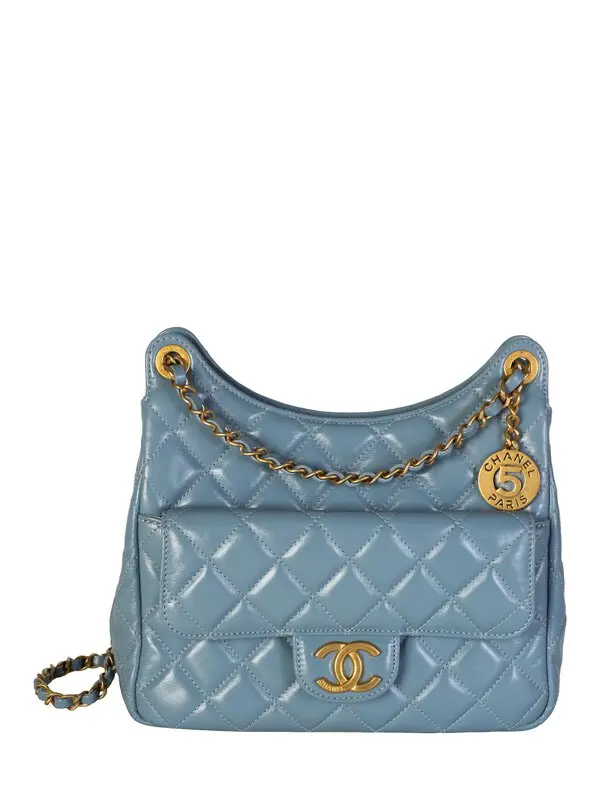Chanel Shiny Quilted Calfskin Wavy Cc Hobo - Blue