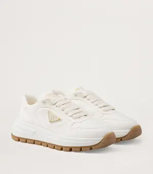 Prada Leather Triangle Sneakers - Neutral