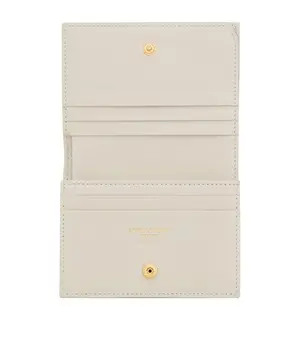 Saint Laurent Quilted Leather Monogram Wallet - White