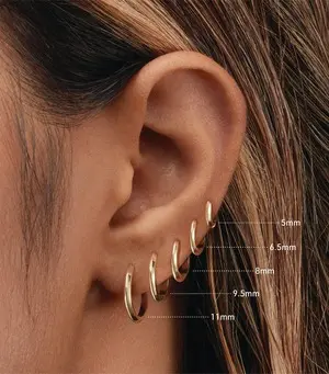 MARIA TASH Faceted Metal Vertex Single Hoop Earring