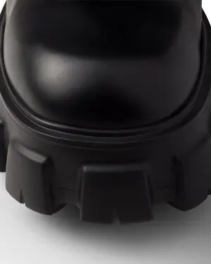 Prada Monolith Brushed Leather And Re-nylon Boots With Pouch