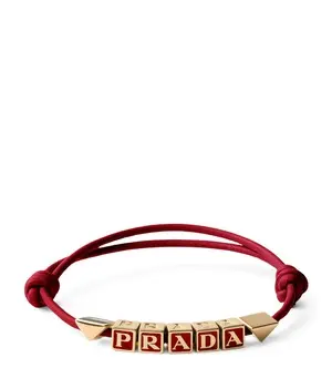 Prada Prada Nappa Leather Knotted Bracelet With Enamel Logo Charm Red