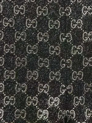 Gucci Logo Patterned Shorts