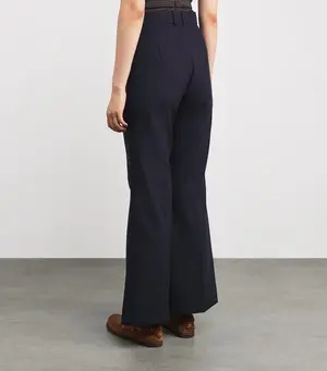 Sandro Wool-blend Flared Trousers With Gold-tone Button Detail