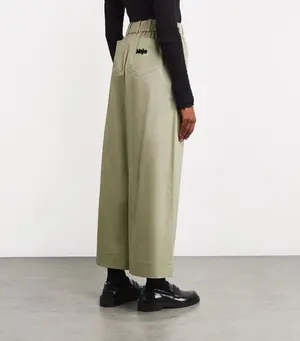 Maje Organic Cotton-blend Wide-leg Trousers With Faux Leather Accent