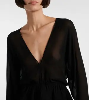 Alaïa Peplum Midi Dress