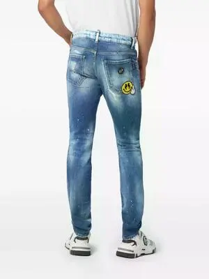 Philipp Plein Smiley Face Appliqué Distressed Jeans