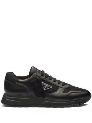 Prada Geometric Panel Leather And Nylon Lace-up Sneakers - Black