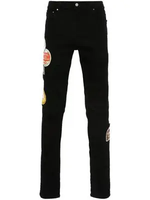 Amiri Travel Patch Repair Skinny Jeans
