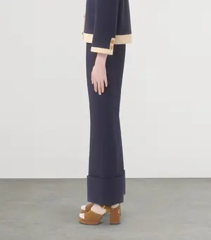 Valentino Garavani Wool-silk Flared Trousers With Turned-up Cuffs