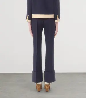 Valentino Garavani Wool-silk Flared Trousers With Turned-up Cuffs