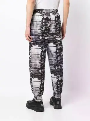 ISO.POETISM Khumbu Abstract-print Track Pants