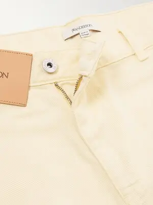 JW Anderson Twisted Low-rise Wide-leg Jeans