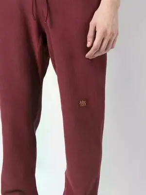 ADVISORY BOARD CRYSTALS Logo-patch Track Pants - Red