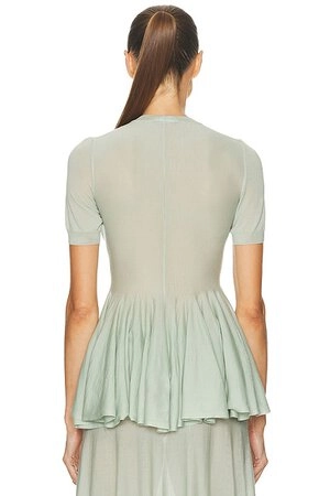 Alaïa Peplum Top In Sage - Vert Amande