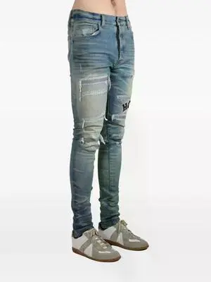 Amiri Distressed Embroidered Jeans