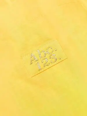 ADVISORY BOARD CRYSTALS Logo Patch Trousers