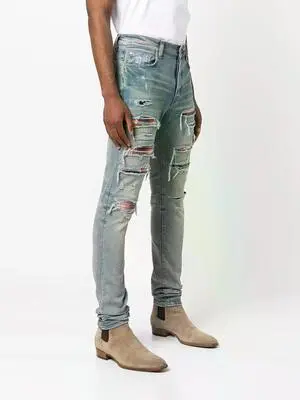 Amiri Distressed Skinny Jeans