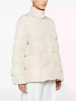 Moncler Quilted Jacket With High Neck And Zipped Pockets - Neutrals