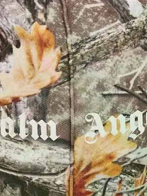 Palm Angels Camouflage-print Side Stripe Flared Trousers