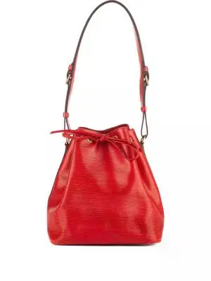 LOUIS VUITTON 1990s Monogram Embossed Leather Bucket Bag