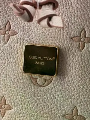 LOUIS VUITTON Noe Outline Monogram Empreinte Leather Nano Backpack