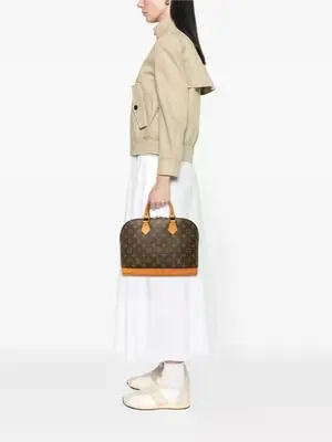LOUIS VUITTON 2001 Monogram Alma Pm Handbag