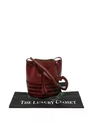 Alaïa Cut-out Drawstring Bucket Bag