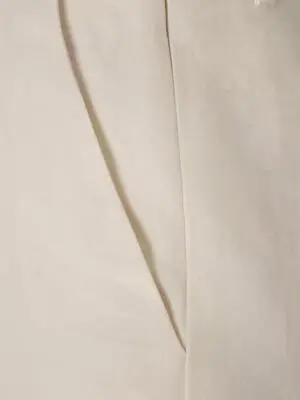 Khaite Pressed-crease Slit-hem Trousers