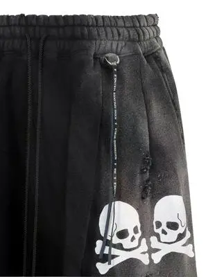 MASTERMIND WORLD Distressed Graphic-print Track Pants