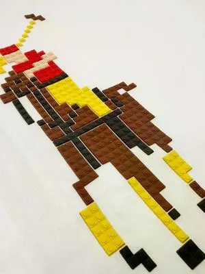 MOSTLY HEARD RARELY SEEN 8-BIT Pixelated Graphic T-shirt