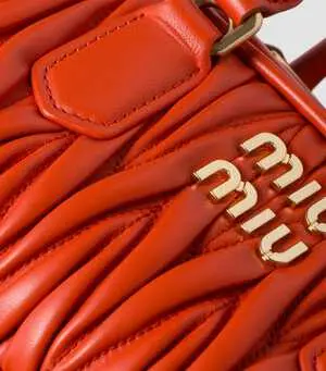 Miu Miu Small Matelassé Leather Arcadie Top-handle Bag - Orange